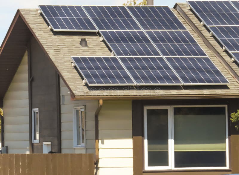 A House with Solar Panels. Concept: Renewable Energy Editorial Stock ...
