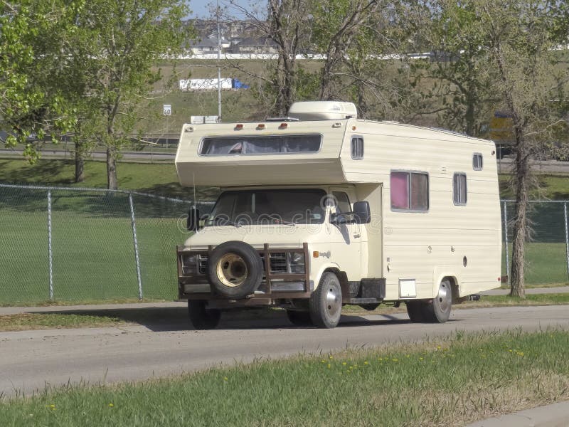 An Old Vintage Trailer Camper or RV Parked during the Spring Editorial ...