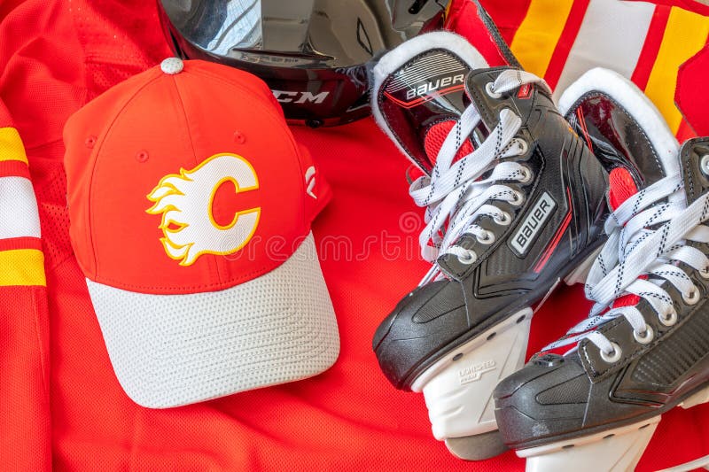 Calgary Flames NHL Team Baseball Cap and Jersey Editorial Photography ...