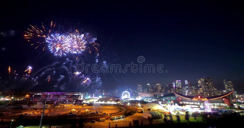 Calgary Downtown Skyline at Night with Fireworks. Stock Footage - Video ...