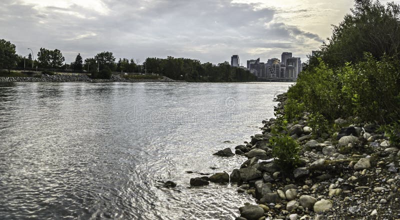 Calgary Skyline Seen from Bow River Stock Photo - Image of brown ...