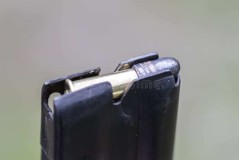 A.22 Caliber Bullet and Clip Stock Photo - Image of armor, action ...