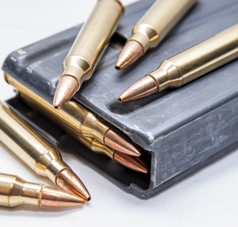 223 Caliber Bullets Along with a Loaded 223 Caliber Rifle Magazine ...