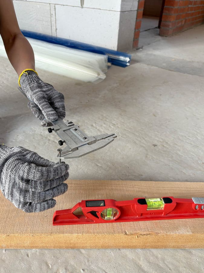 Caliper and Level for Measuring during Construction of a Residential ...