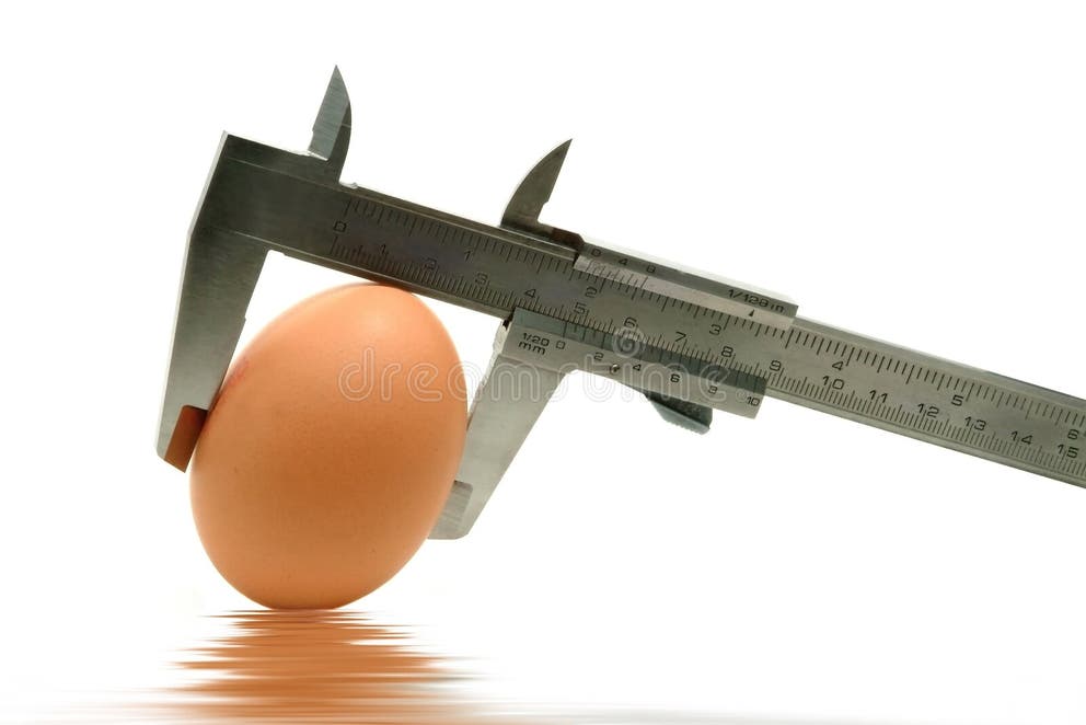 Caliper measuring the egg stock image. Image of exercise - 2446829