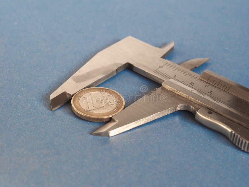 Caliper measuring tool stock photo. Image of currency - 89740052