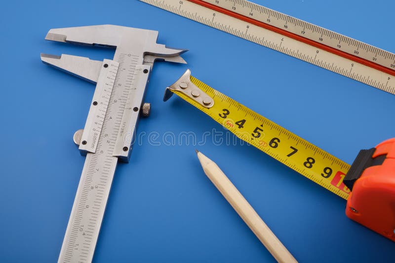 Caliper, Ruler and Pencil on Technical Drawings. Stock Image - Image of ...