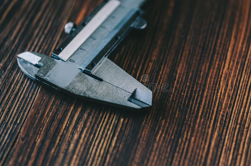 Caliper on Table stock photo. Image of rule, caliper - 103977986