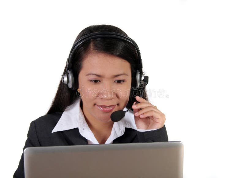 Call Center Executive Sitting at Desk and Talking on Headphones Stock ...
