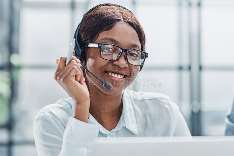 Call Center Agent with Headset Working on Support Hotline in Modern ...