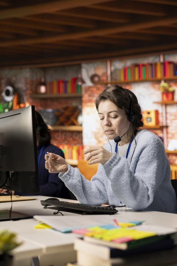 Call Center Agent in Office Addressing Clients Complaints Stock Photo ...