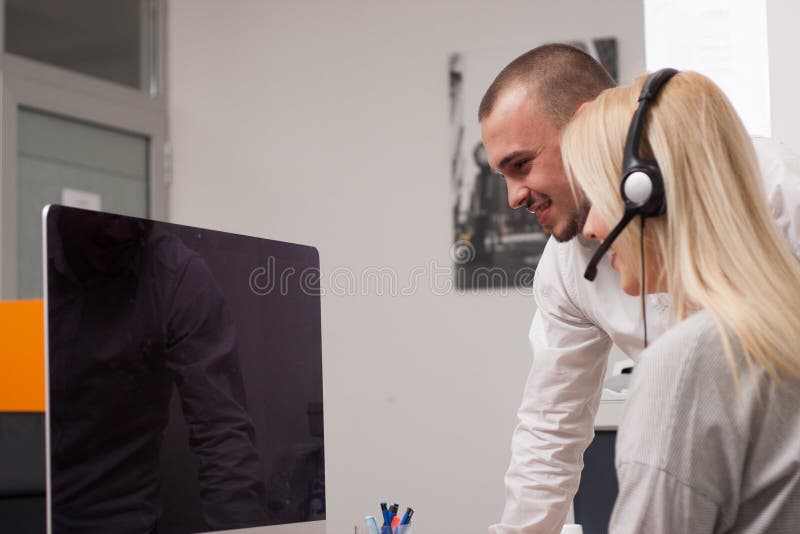 Call center agent at work stock photo. Image of businesswoman - 65975322