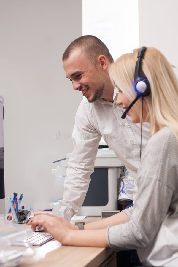 Call center agent at work stock photo. Image of headset - 65975628