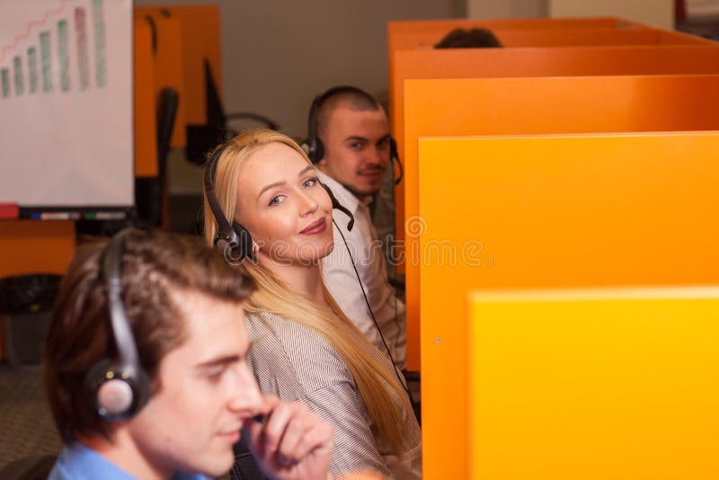 Call center agents at work stock photo. Image of service - 65972520
