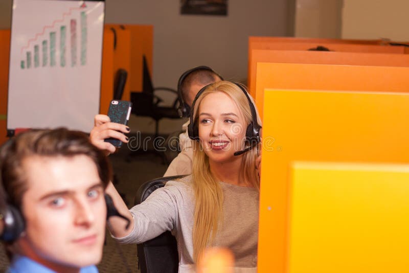 Call center agents at work stock image. Image of centre - 65972827