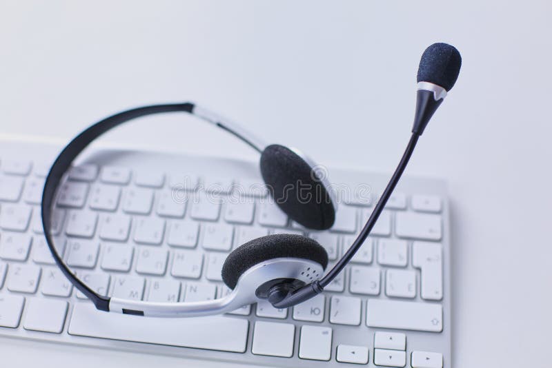 Call Center and Customer Service Help Desk. VOIP Headset on Laptop ...