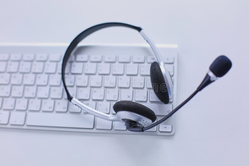 Call Center and Customer Service Help Desk. VOIP Headset on Laptop ...