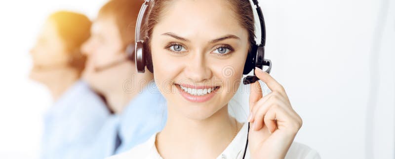 Call Center. Diverse Customer Service Operators in Headsets at Work in ...
