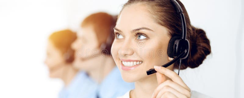Call Center. Diverse Customer Service Operators in Headsets at Work in ...