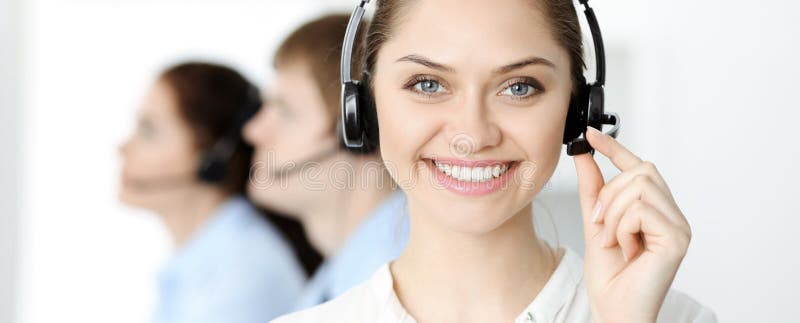 Call Center. Diverse Customer Service Operators in Headsets at Work in ...