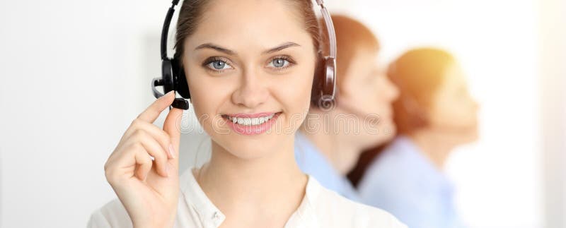 Call Center. Diverse Customer Service Operators in Headsets at Work in ...