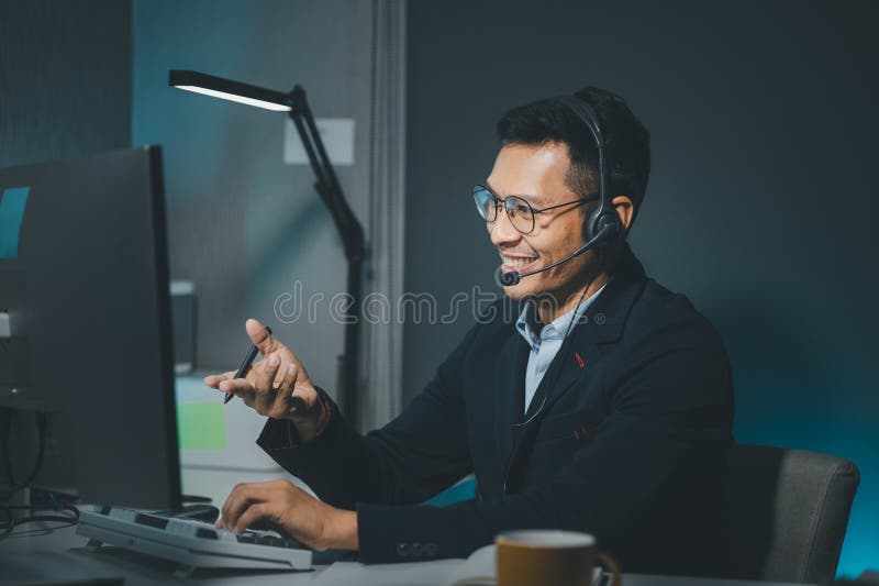 Call Center Employee Talking with Customer through Headset, the ...