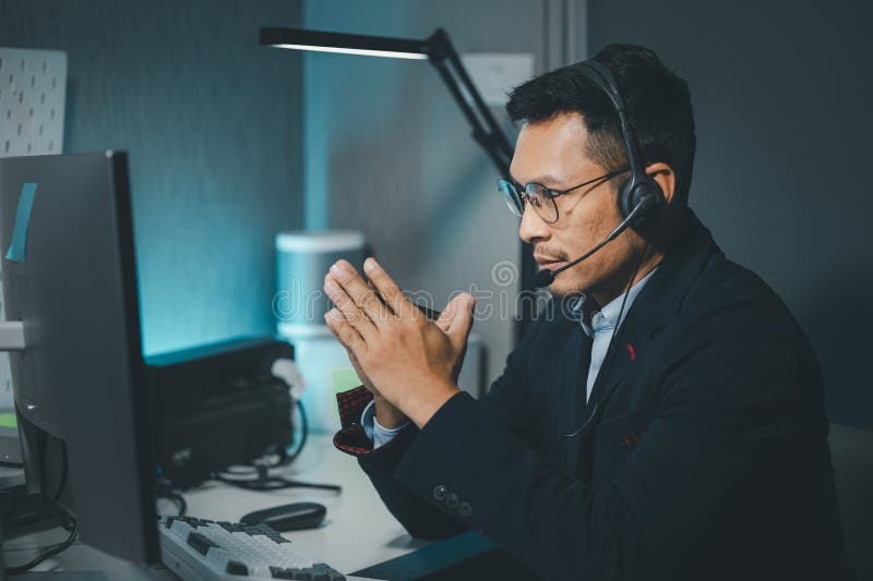 Call Center Employee Talking with Customer through Headset, the ...