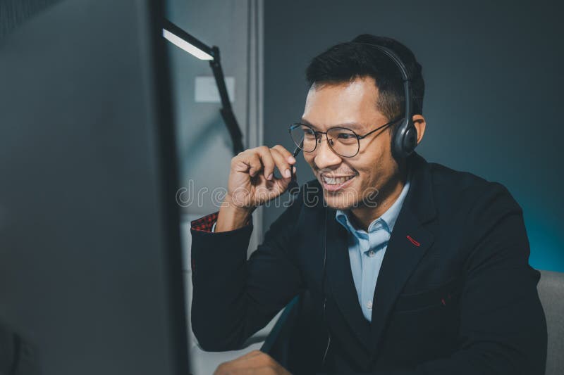 Call Center Employee Talking with Customer through Headset, the ...
