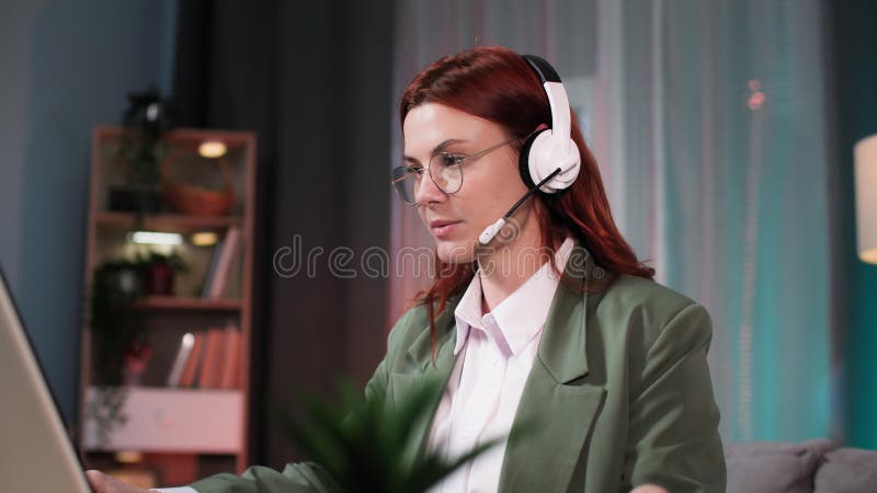 Call Center, Female Operator Talking Via Video Conference Using a ...