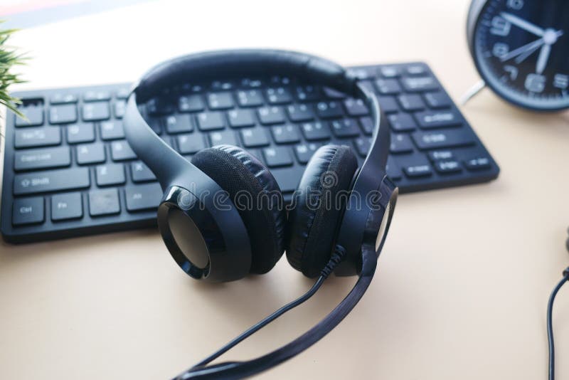 Call Center Headphone on Laptop on Table , Stock Photo - Image of ...