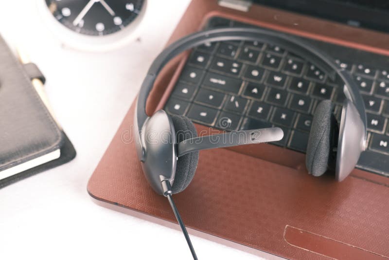 Call Center Headphone on Laptop on Table , Stock Photo - Image of ...