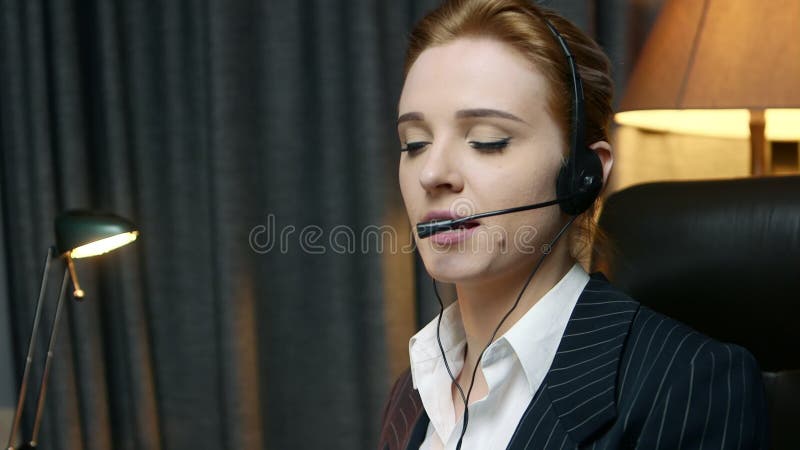 Call Center Operator Answers the Call and Communicates with the Client ...