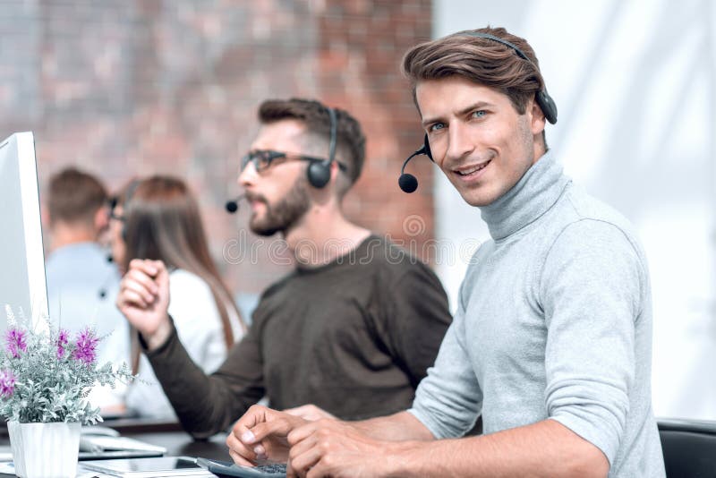 Call Center Operator Sitting at His Desk. Stock Image - Image of ...