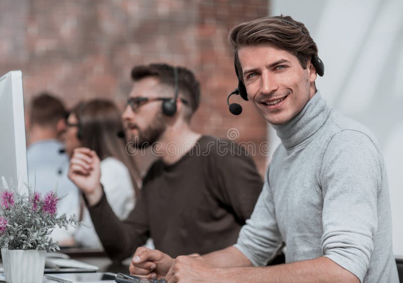 Call Center Operator Sitting at His Desk. Stock Photo - Image of ...