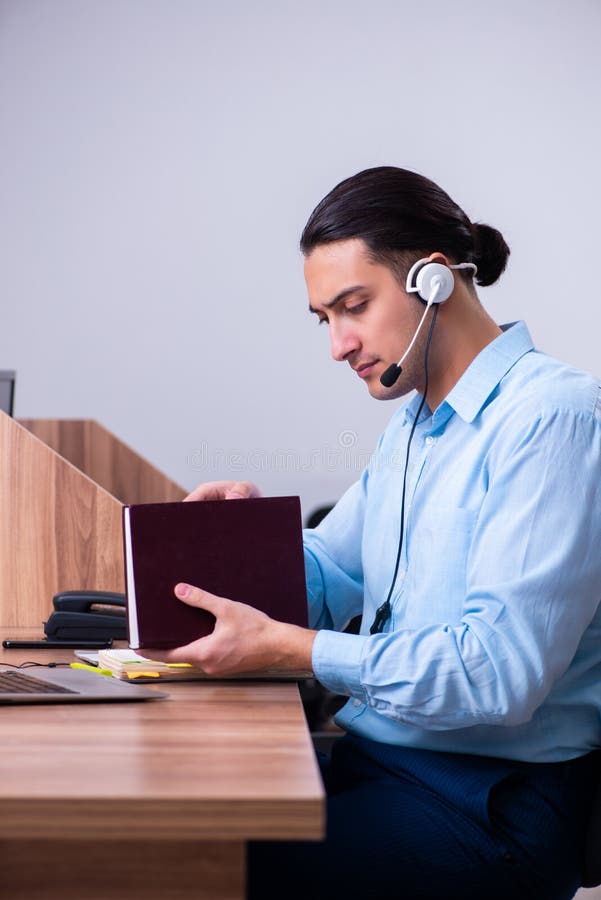 Call Center Operator Working at His Desk Stock Photo - Image of desk ...