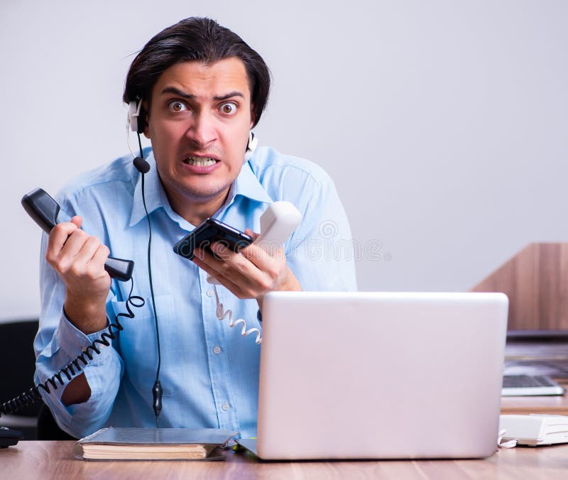 Call Center Operator Working at His Desk Stock Photo - Image of ...