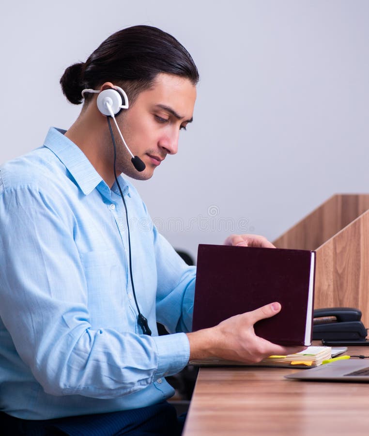Call Center Operator Working at His Desk Stock Photo - Image of ...