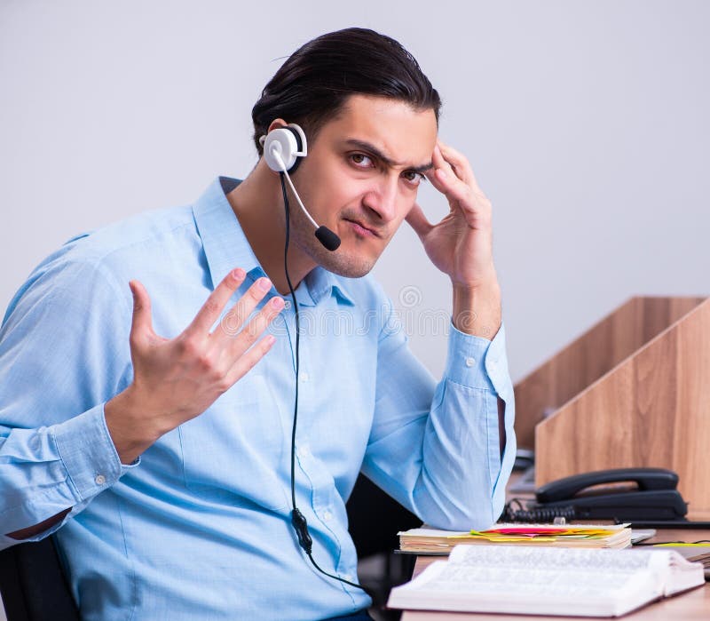 Call Center Operator Working at His Desk Stock Image - Image of call ...