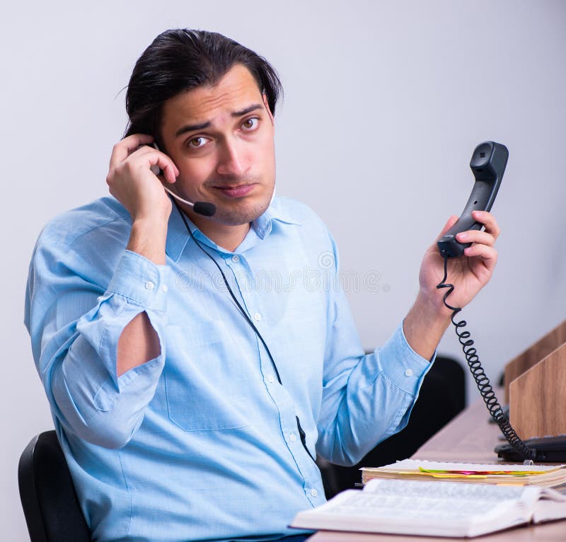 Call Center Operator Working at His Desk Stock Photo - Image of hotline ...