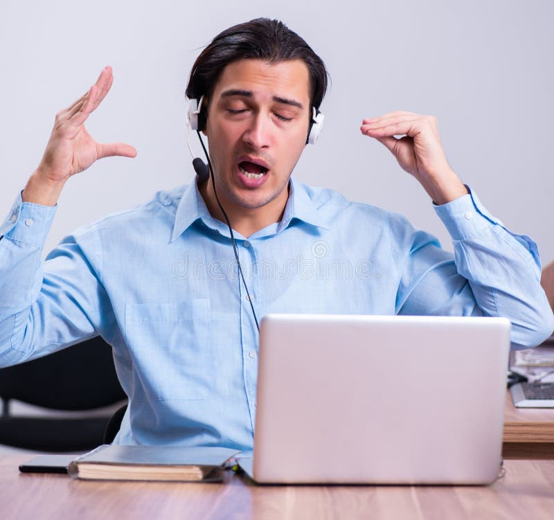 Call Center Operator Working at His Desk Stock Photo - Image of centre ...