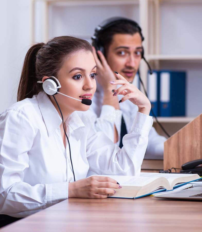 Call Center Operators Working in the Office Stock Photo - Image of book ...