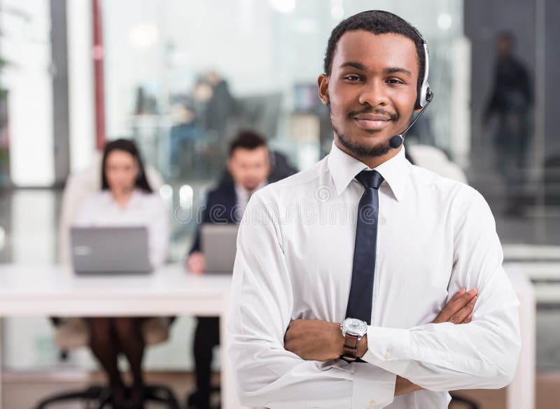 African American Man Working at a Computer in a Call Centre Stock Image ...