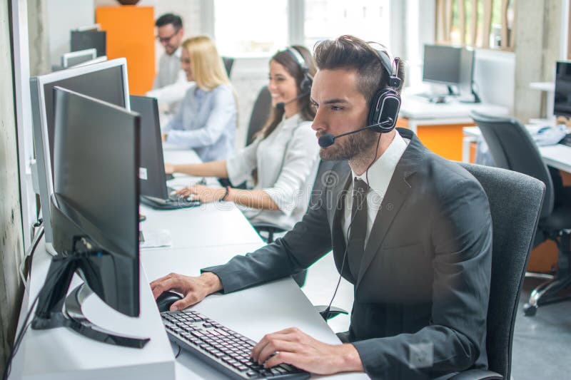 Call Center Team Talking with Customers. Stock Photo - Image of call ...