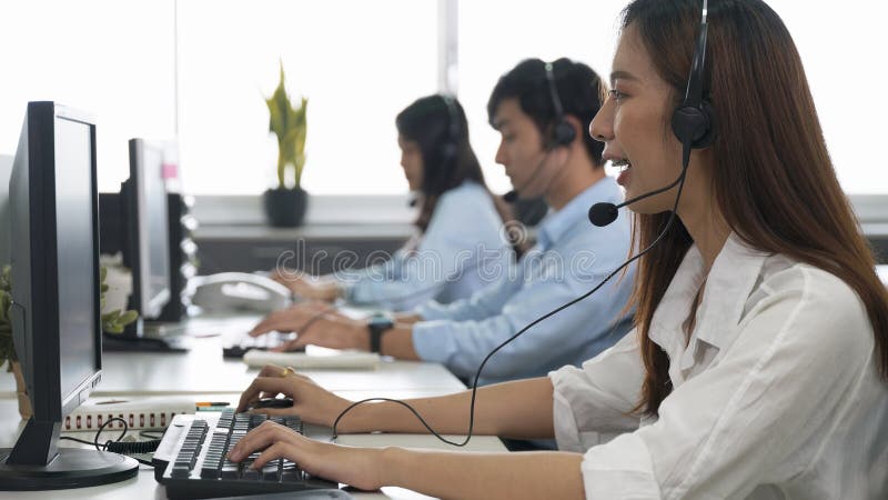 Call Center Young Employee Working with Headset, Smiling Customer ...