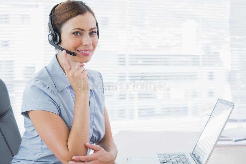 Call Centre Agent Wearing Headset at Her Desk Stock Photo - Image of ...