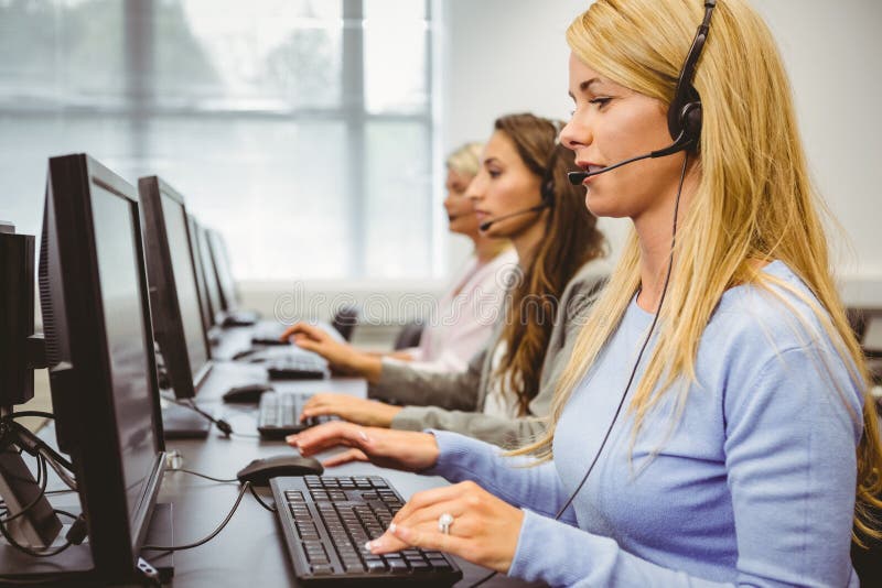 Call Centre Agents Talking on the Headset Stock Image - Image of side ...