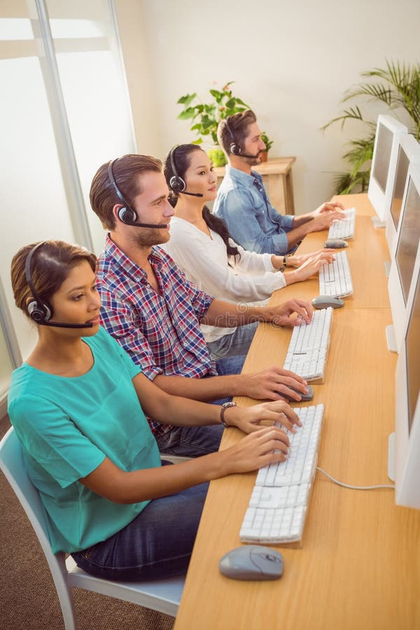 Call Centre Colleagues at Work Stock Photo - Image of indoors ...