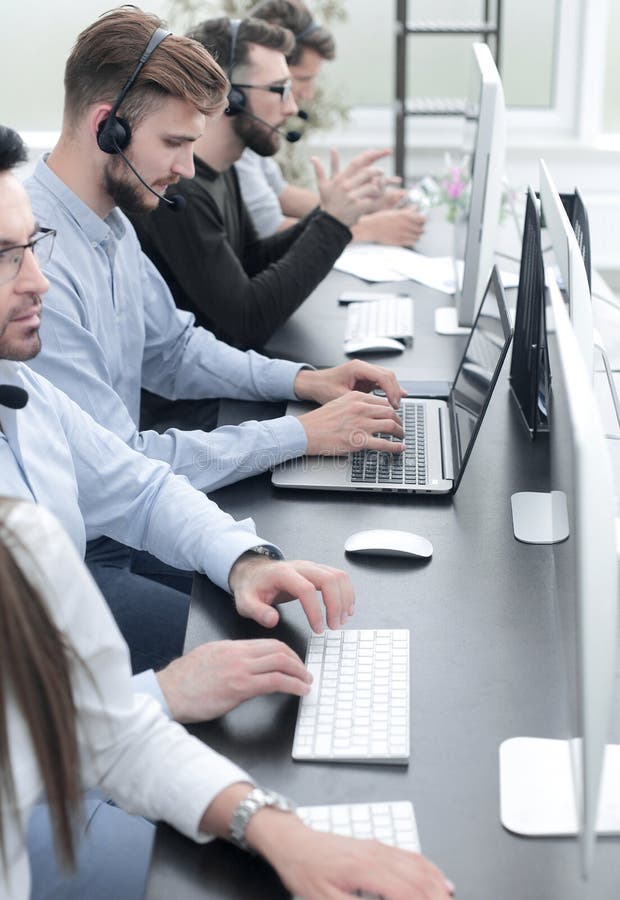 Call Centre Employees Working on Computers with Their Headset Stock ...