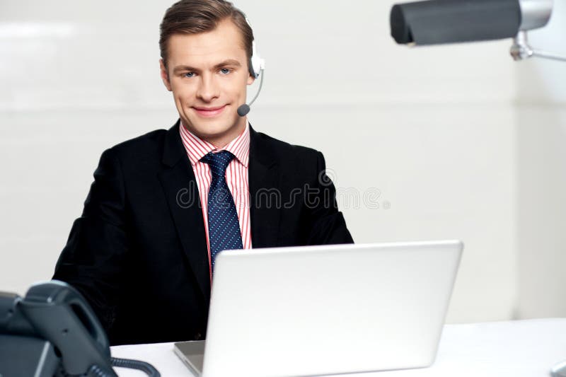 Call Centre Executive Posing with Headsets Stock Photo - Image of ...
