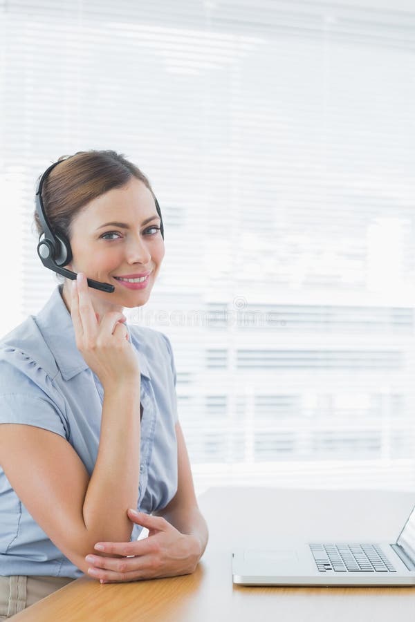 Call Centre Operator Wearing Headset at Her Desk Stock Photo - Image of ...